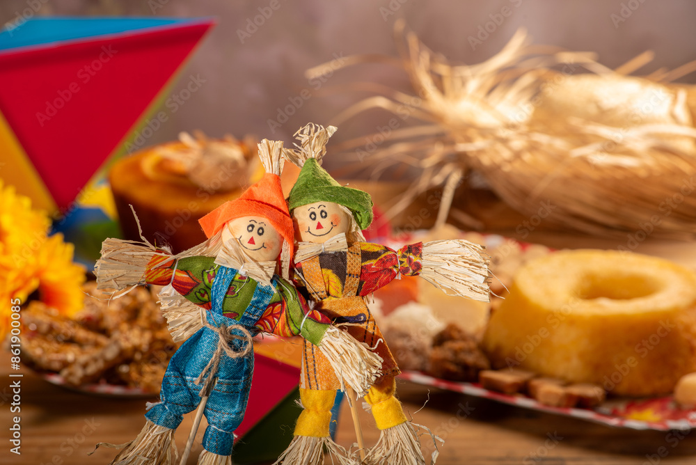 Festa Junina, straw dolls in front and in the blurred background a ...