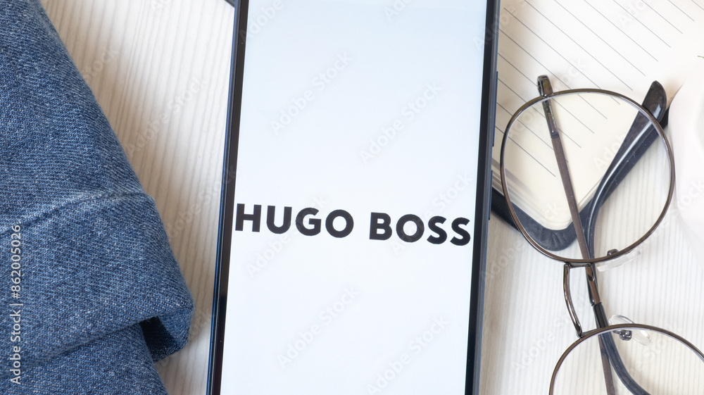 New York, USA - 21 June 2024: Hugo Boss Logo on Phone Screen, Company ...