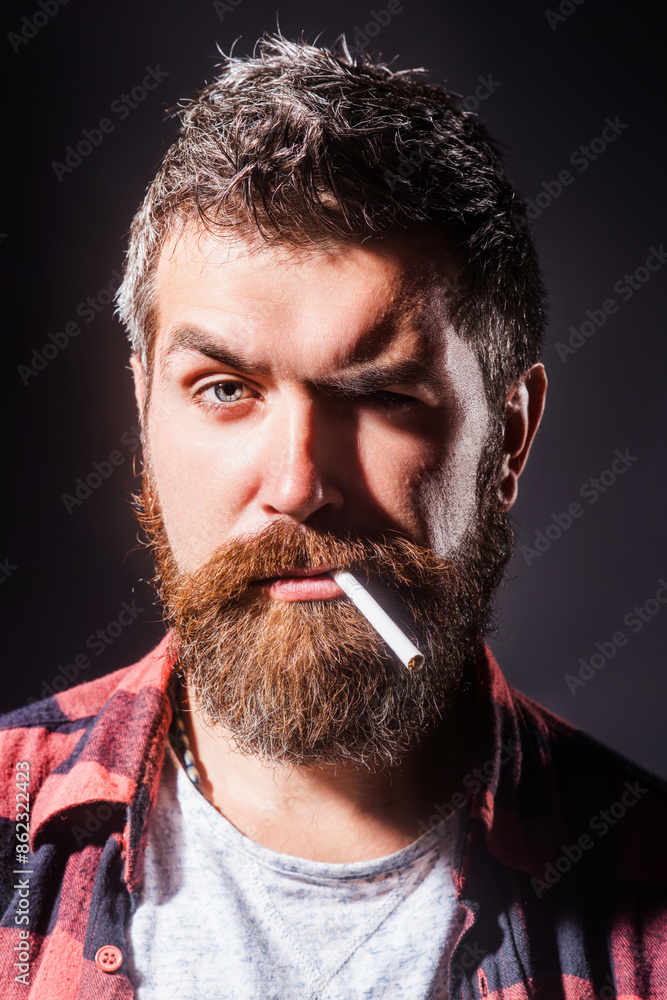 Bearded man smoke cigarette. Man retro beauty. The prickly bristle ...