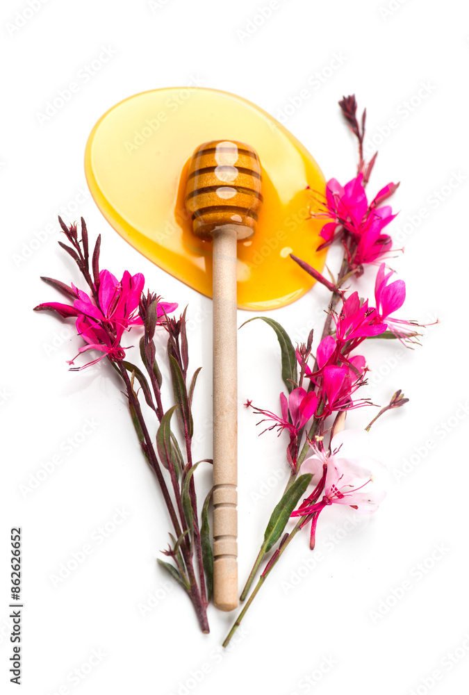 Honey dripping, pouring from wooden honey dipper spoon, isolated on ...