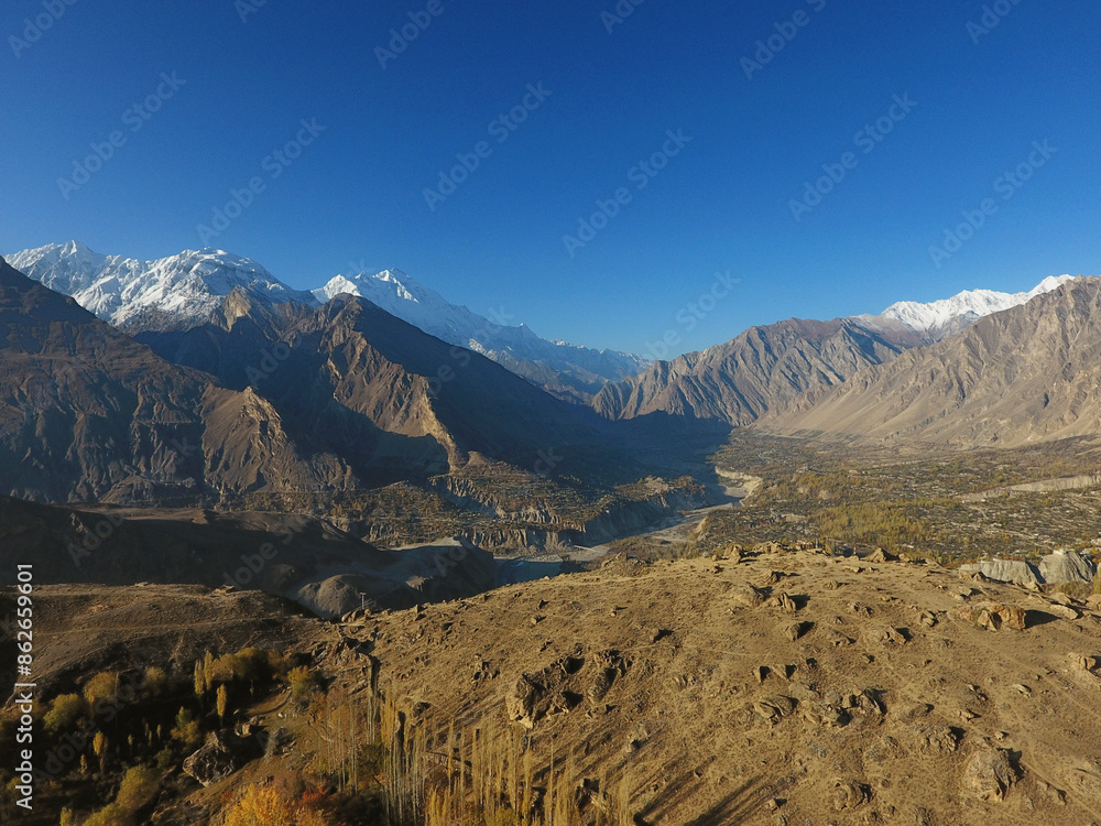 Aerial view of Majestic Hunza Valley with Snow Capped Mountains and ...