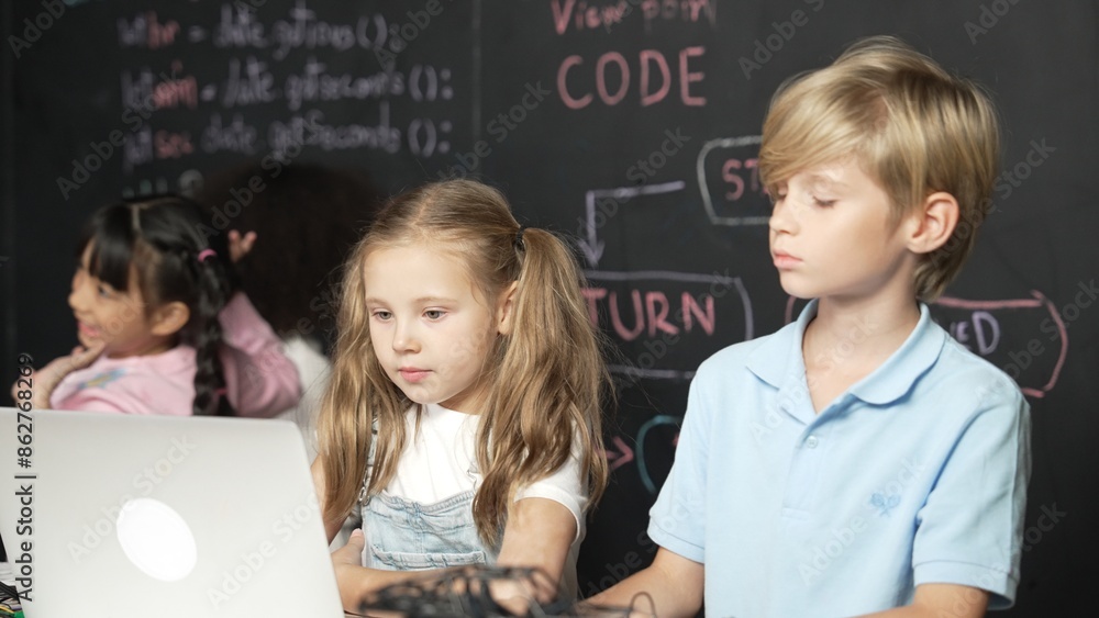 Smart girl using laptop programing engineering code with diverse ...