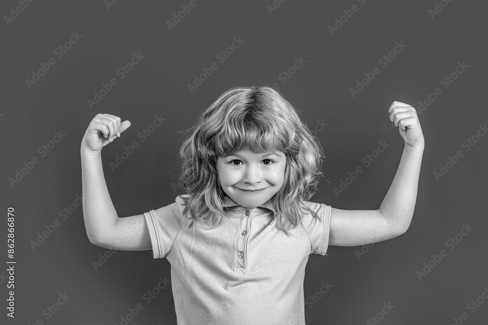 School boy isolated over green chalkboard background. Funny little ...