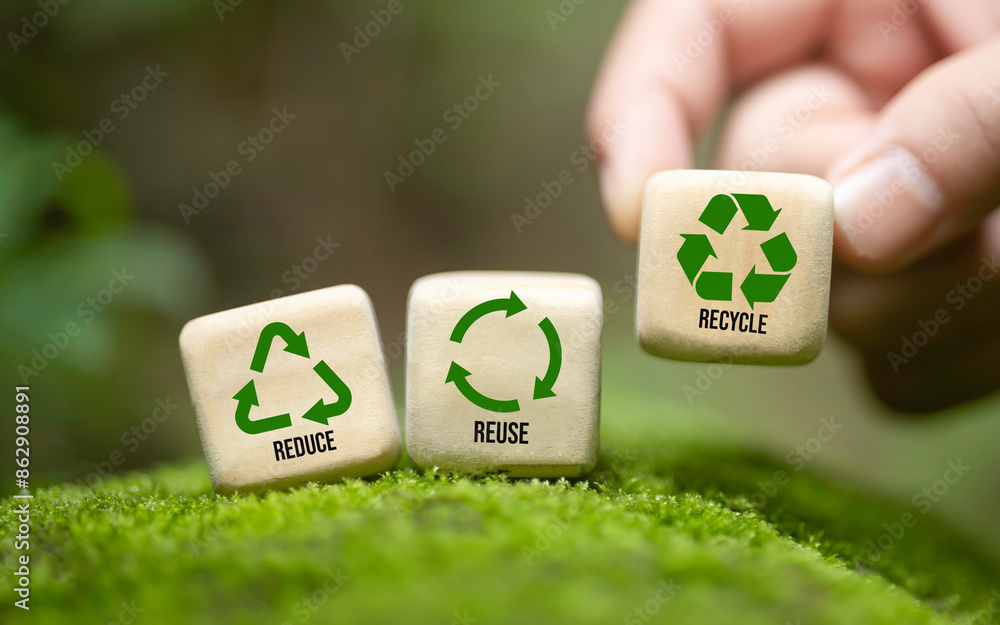 Icons related to reduce, reuse, recycling on green background blocks ...