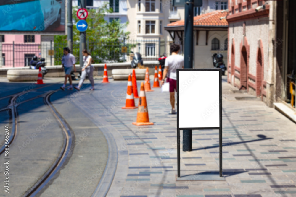 White vertical advertising poster on Istiklal Street. Billboard in the ...