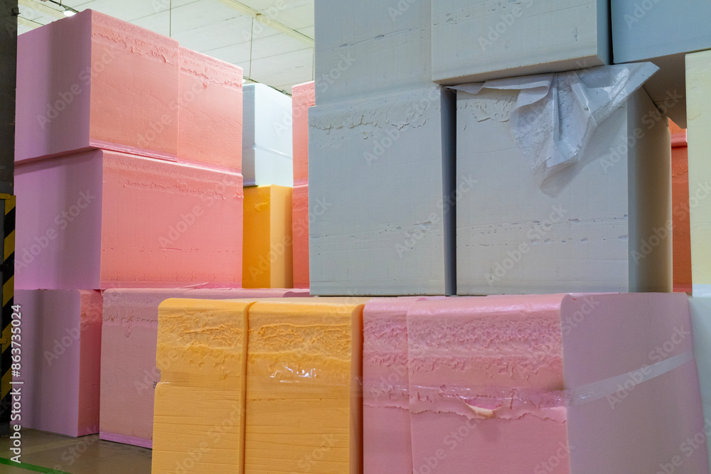 Warehouse of polyurethane foam blocks. Multicolored polyurethane foam ...