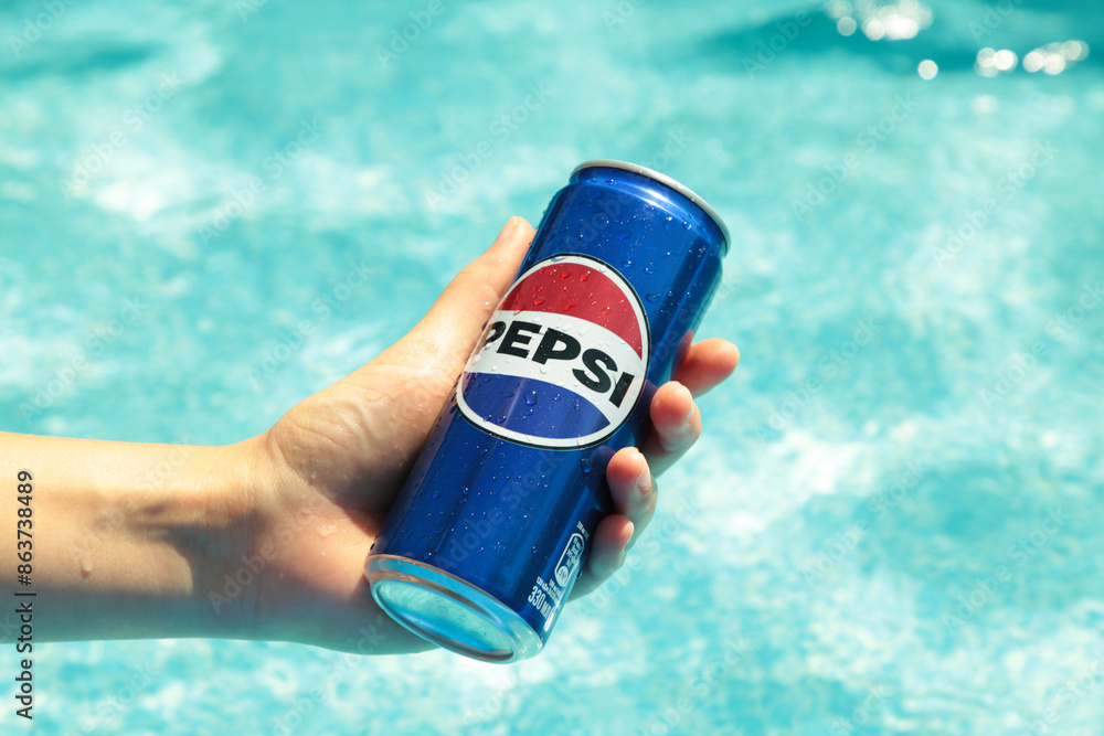 Mykolaiv, Ukraine - June 2024: Can with cold drink Pepsi in the hand ...