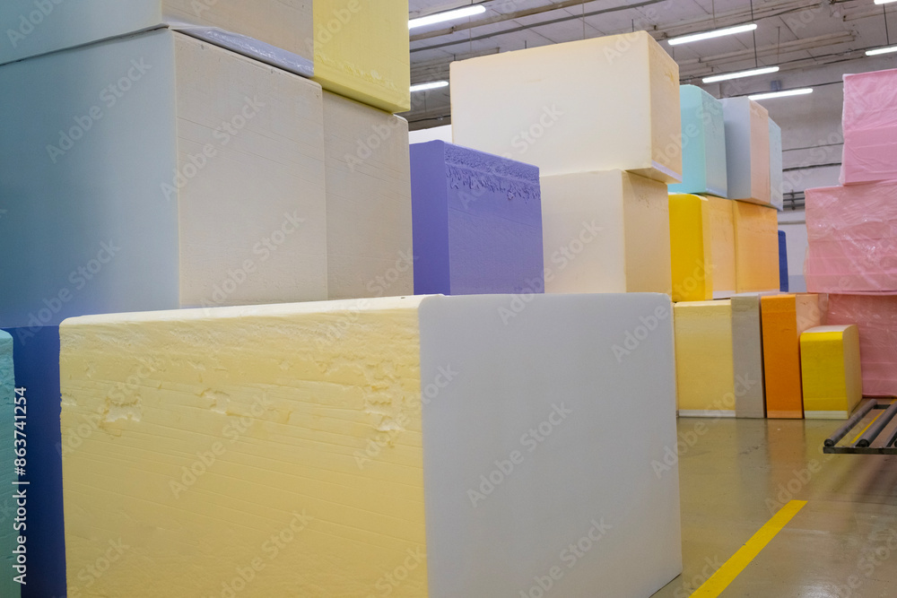 Warehouse of polyurethane foam blocks. Multicolored polyurethane foam ...