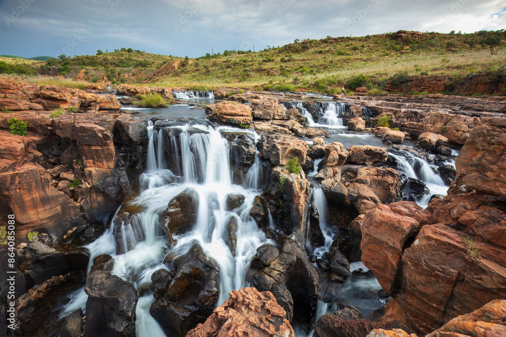 Rock formation in Bourke's Luck Potholes, Bridge over Bourke's Luck ...