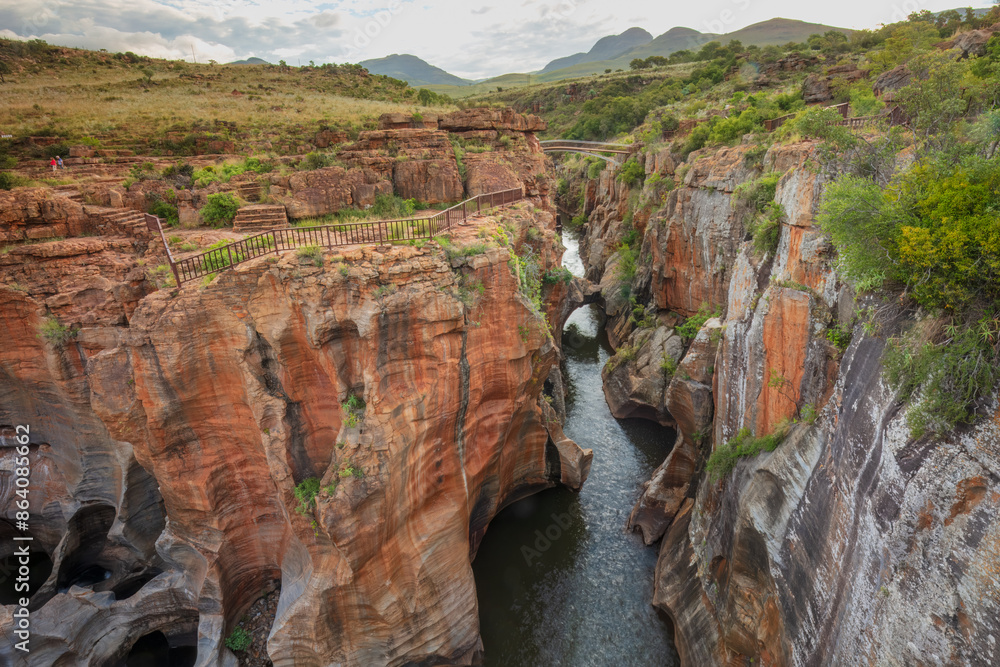 Rock formation in Bourke's Luck Potholes, Bridge over Bourke's Luck ...