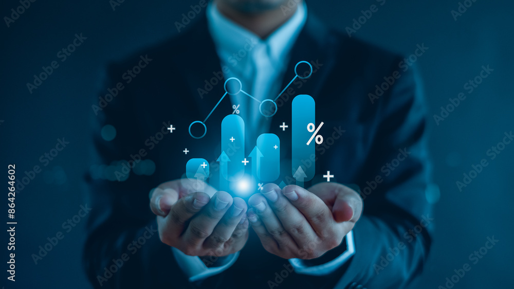 Foto de Businessman calculating income and return on investment, stock ...