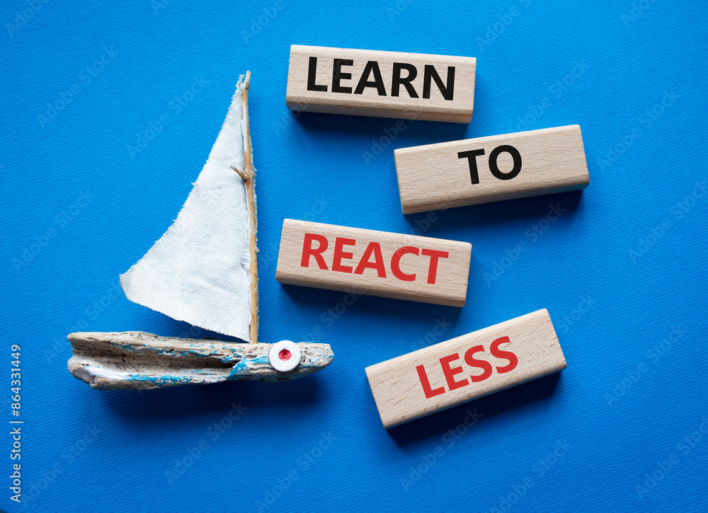 Learn to react Less symbol. Wooden blocks with words Learn to react ...