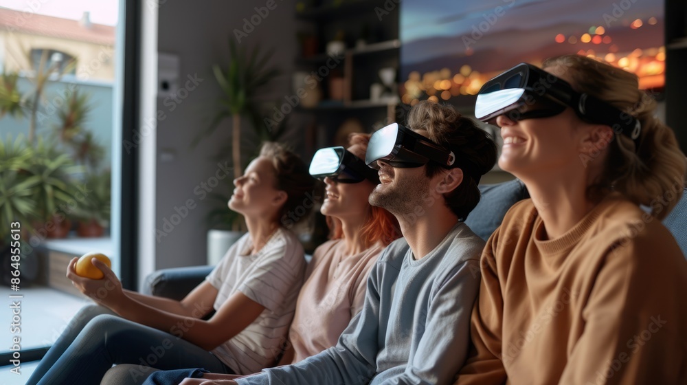 Group of happy people sharing time together while using VR headsets and ...