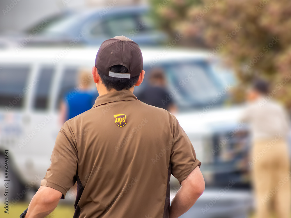 Calgary, Alberta, Canada. Jun 25, 2024. A rear view of a UPS delivery ...