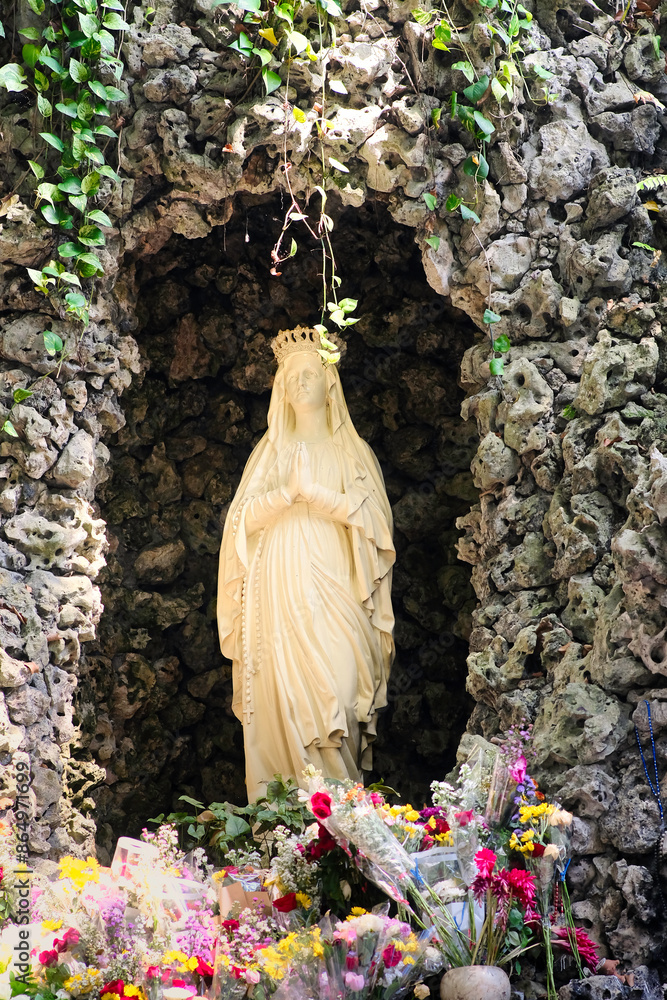 The sculpture of St. Virgin Mary at Sendang Sono chapel where pilgrims ...