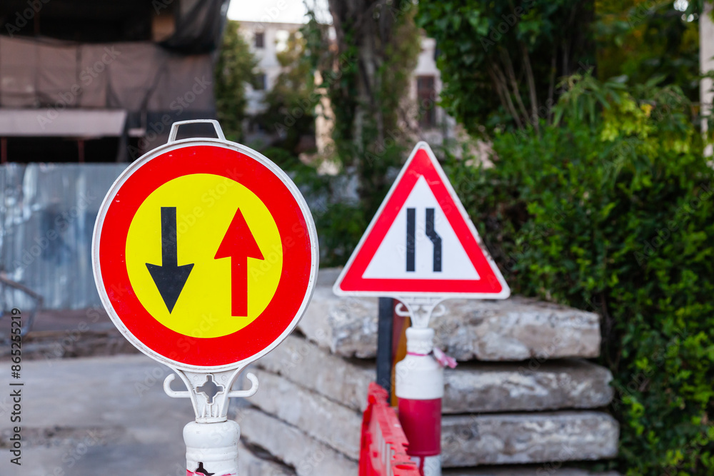 Warning signs and plastic fences at a construction site. Stock Photo ...