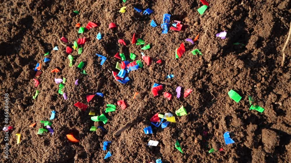 Stockvideon Microplastic pollution. Microplastics in ground. Soil ...