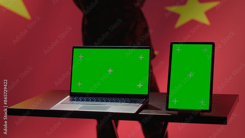 China army soldier using isolated screen laptop and tablet to identify ...