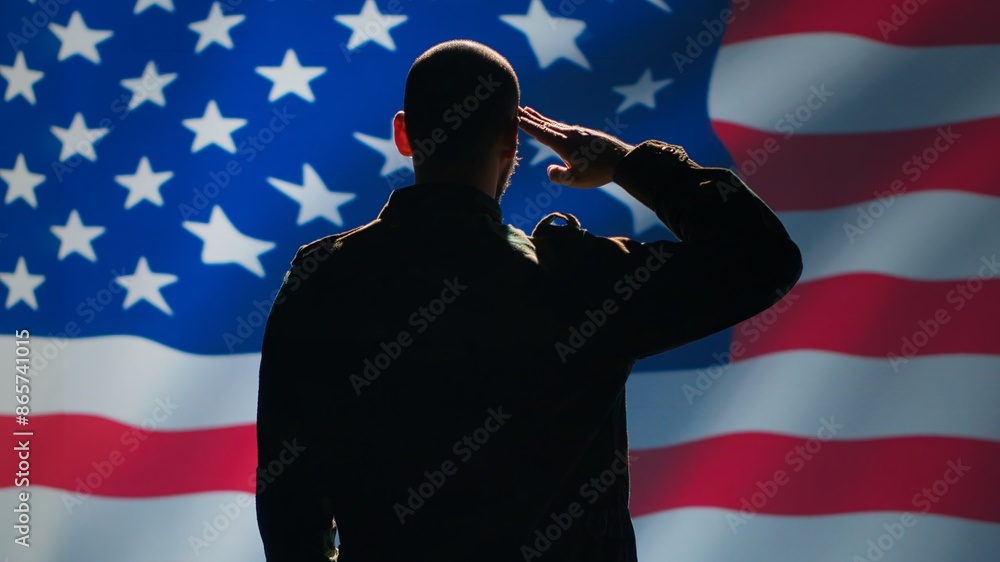 American soldier doing saluting hand gesture towards USA flag in ...