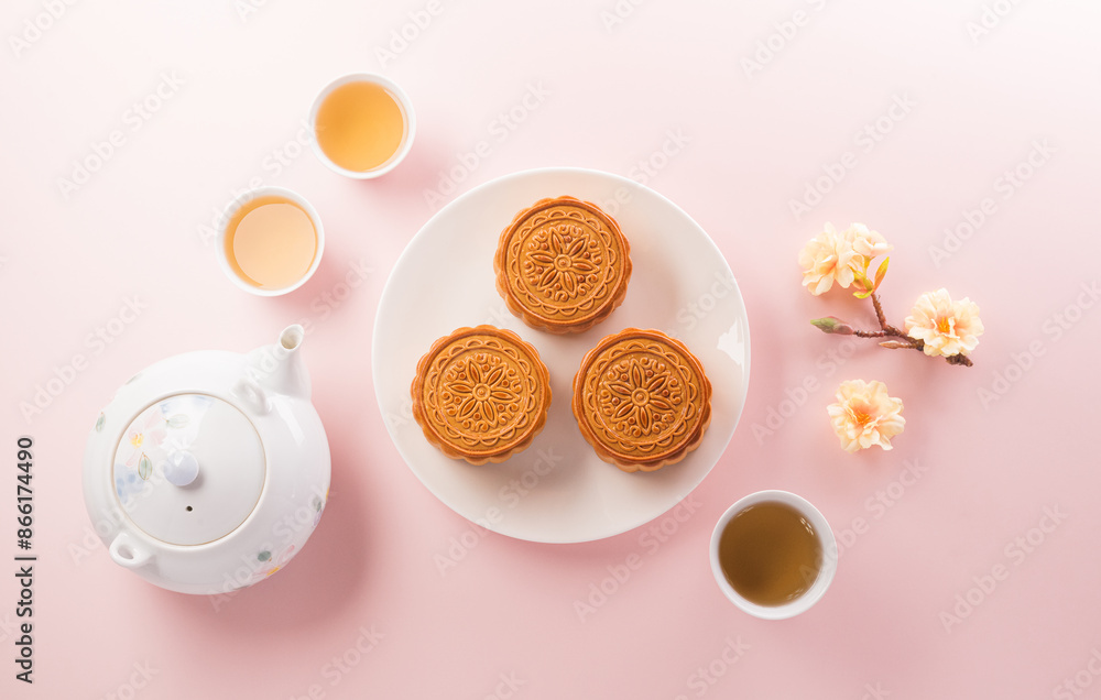 Chinese Mid-Autumn Festival concept made from mooncakes, tea and plum ...