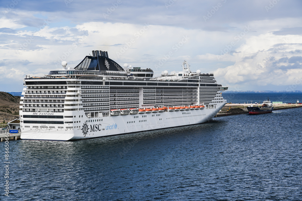The large MSC Fantasia cruise ship docked at the Oceankaj Cruise Pier ...