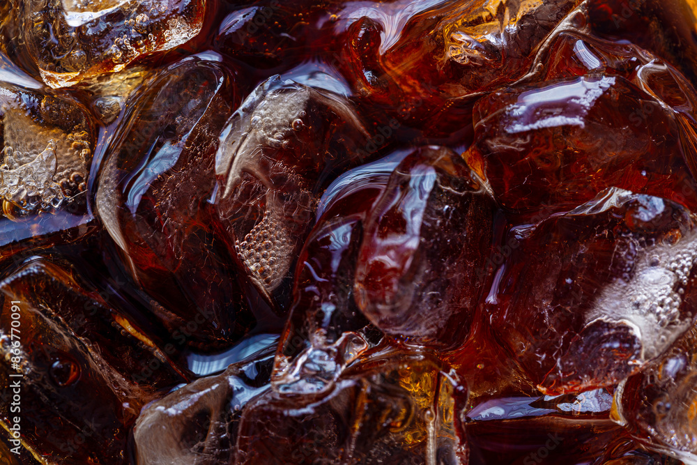 Macro cola background,Background of cola with ice and bubbles. Side ...