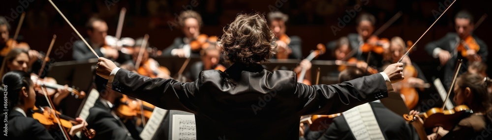 From behind the orchestra conductor you can witness their commanding ...