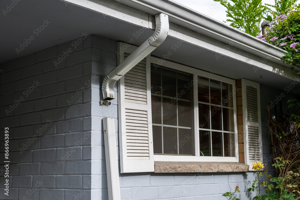 Homeowner maintenance, sections of rain gutter downspout removed for ...