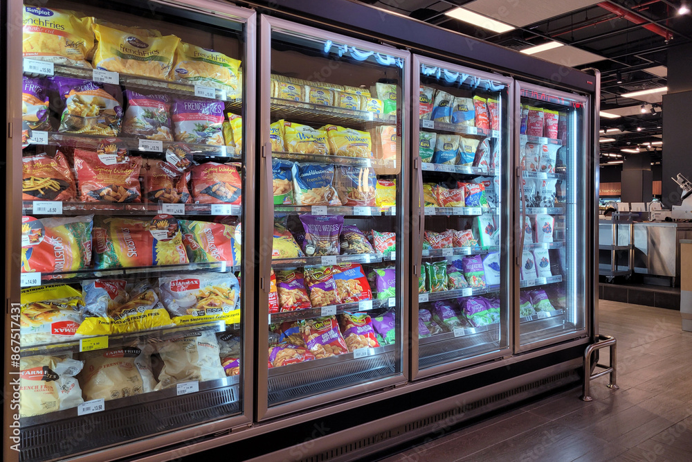 KL, MALAYSIA - 13 FEB 2024: Interior view of a large refrigerator with ...