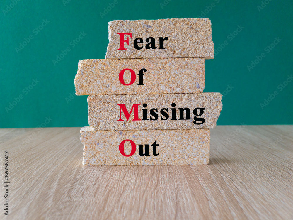 Fear of missing out symbol. Concept words Fear of missing out on brick ...