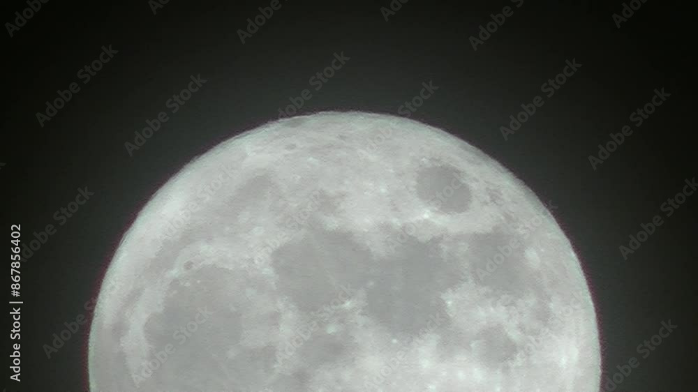 Dark sky and visible surface of moon of full moon in December called ...