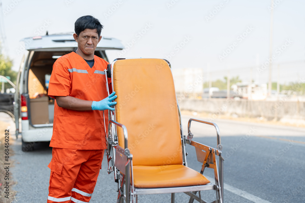 Senior Asian male EMS paramedics or emergency medical technicians in ...