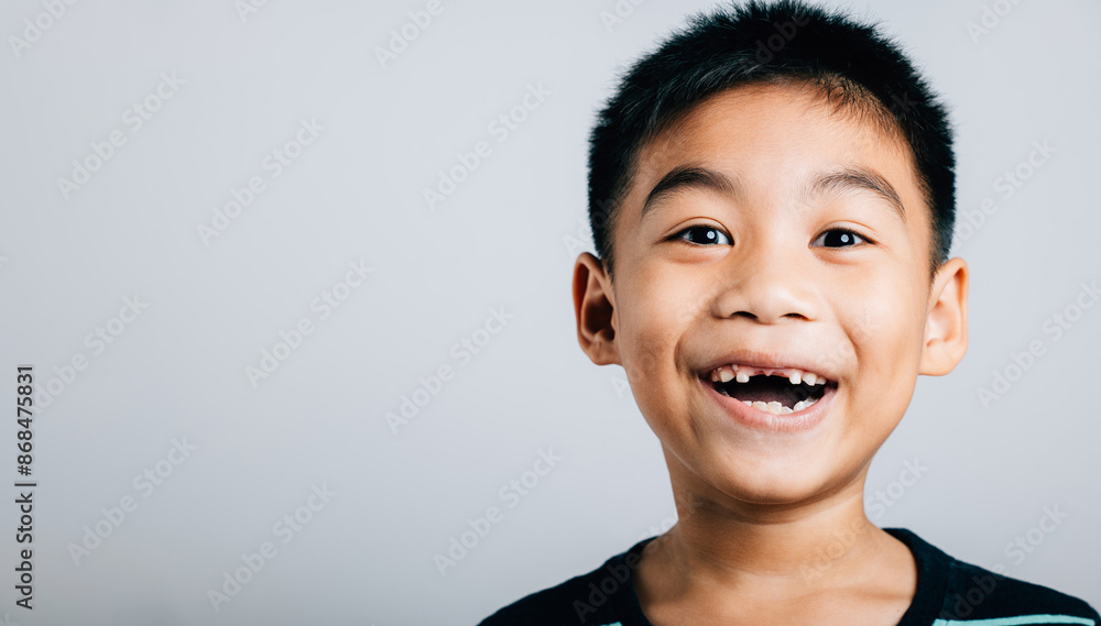 Boy grinning lost upper tooth gap showing in wide smile. Child dental ...