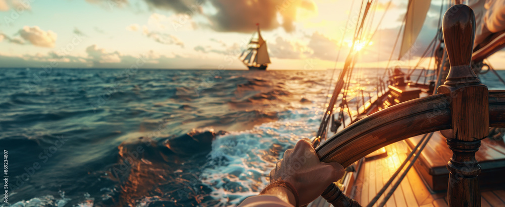 captain first person view of hands on the helm wheel, sailing ship in ...