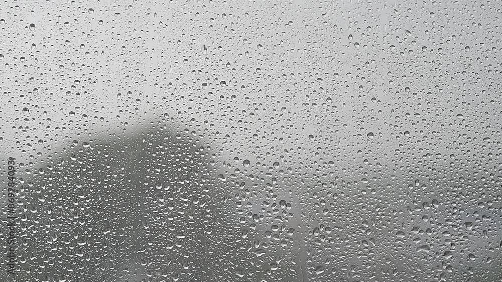 rain falling, raining outside window, focus on drops on window, summer ...