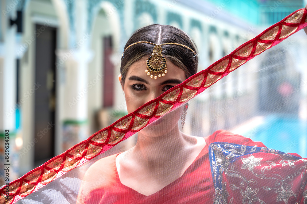 Portrait young pretty Indian woman in traditional clothing covering ...