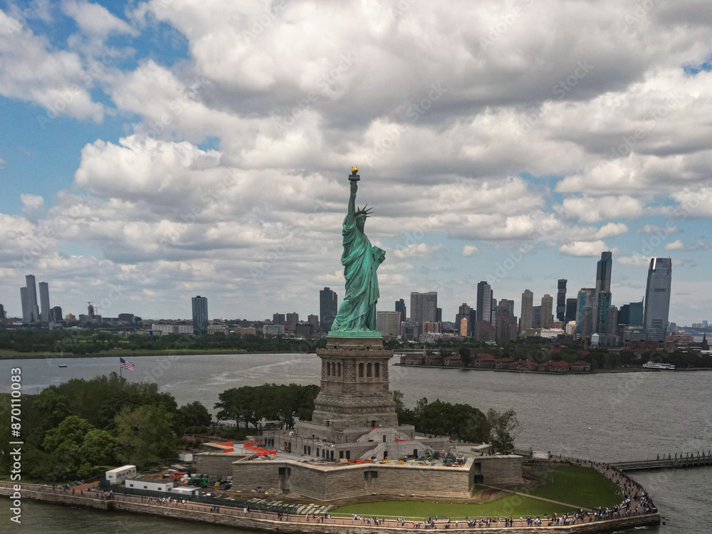 The Statue of Liberty over the Panorama of New York cityscape. Symbol ...