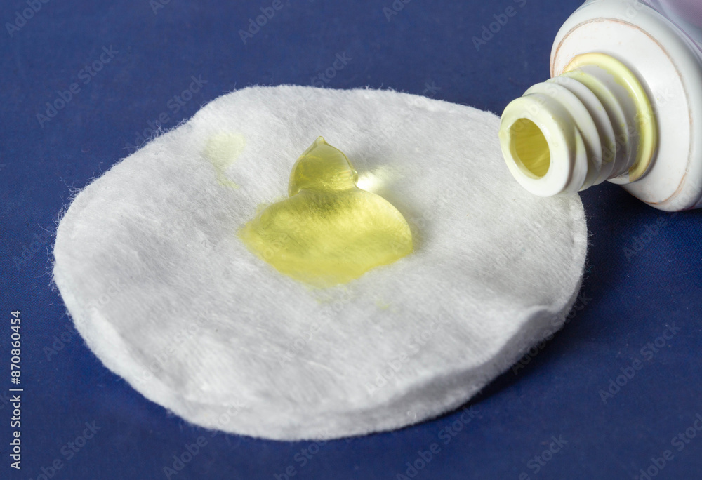 Therapeutic yellow cream ointment is squeezed out of the tube onto a ...
