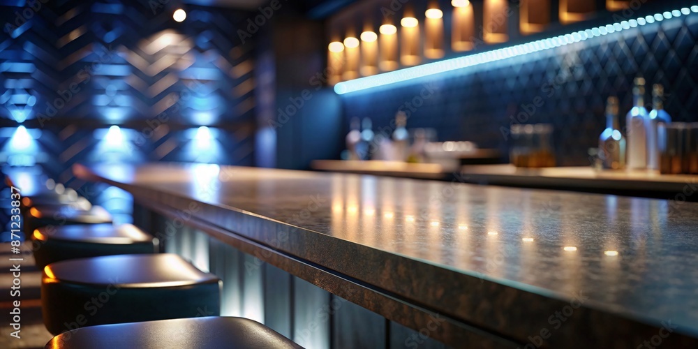 Atmospheric Bar Counter at Night. A close-up view of a polished wooden ...