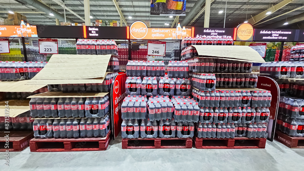 Plastic bottles display of Coke Coca-cola on display piled in multiple ...