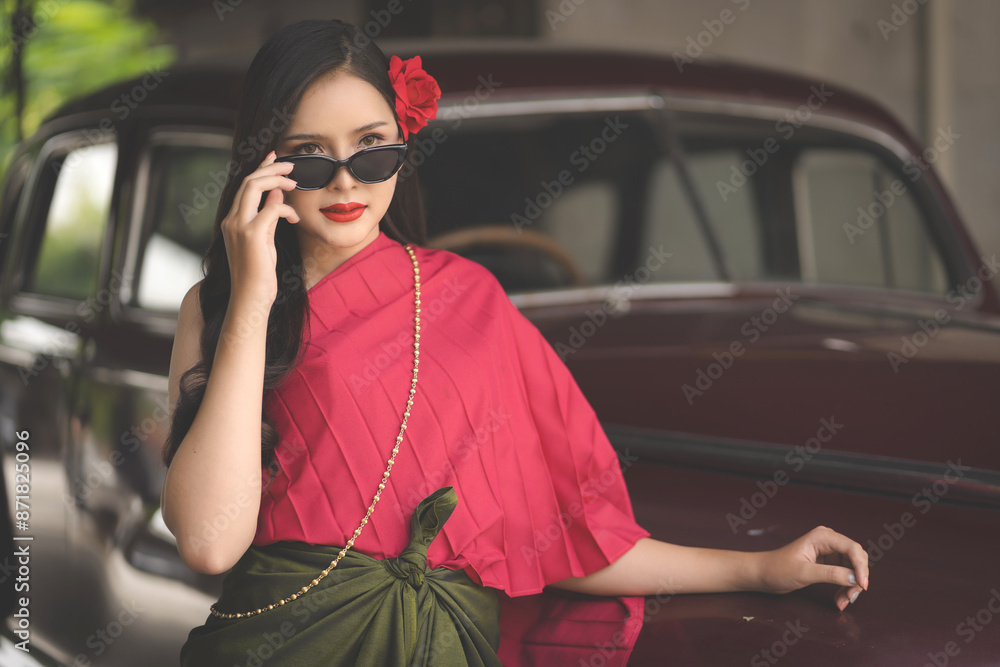 Beautiful portrait of an Asian female. A pretty woman wearing a red ...