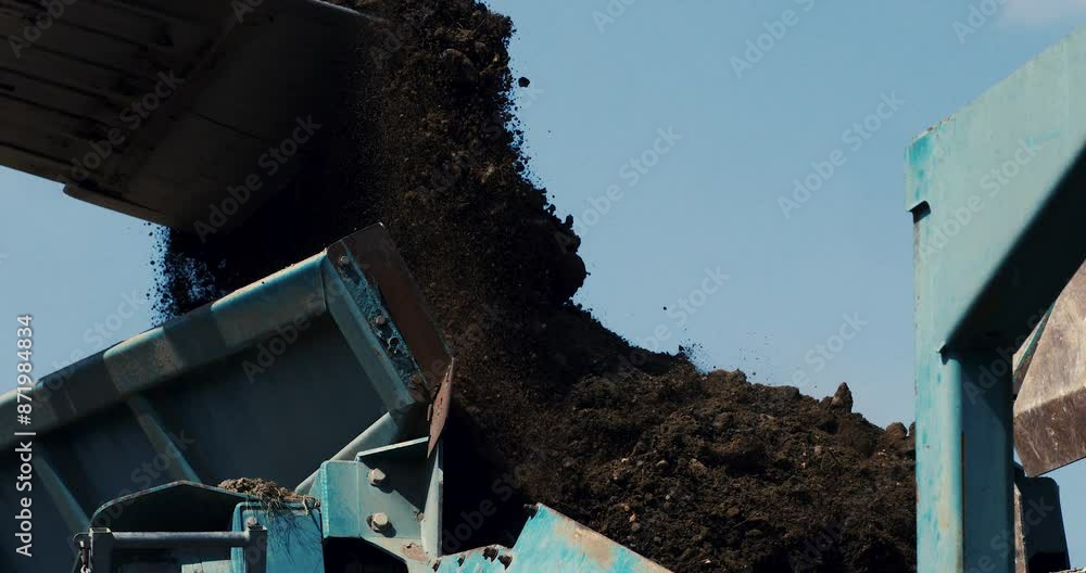 Super slow motion macro of slate concrete debris of demolition of roads ...