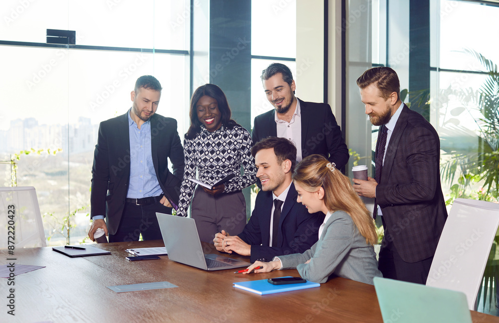 Happy multinational office people team communicating during a work ...