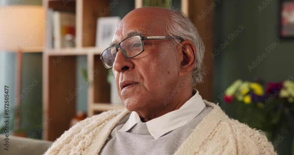 Thinking, remember and sad old man on couch in living room of ...