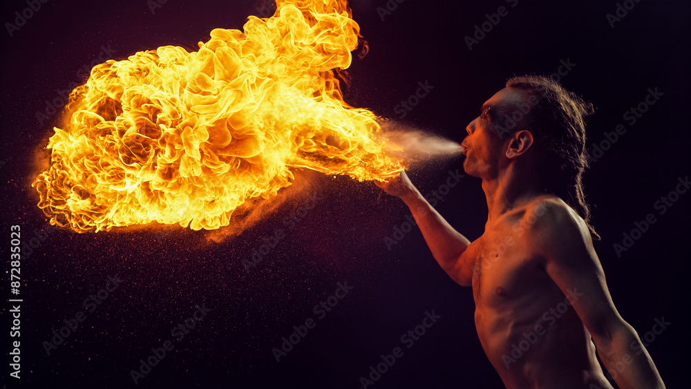 Shirtless Male Fire Performer With Dreadlocks Expertly Breathes Massive ...