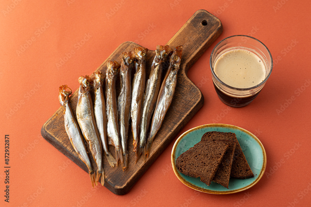 Dry fish with black bread and beer. Dry and smoked fish is a ...