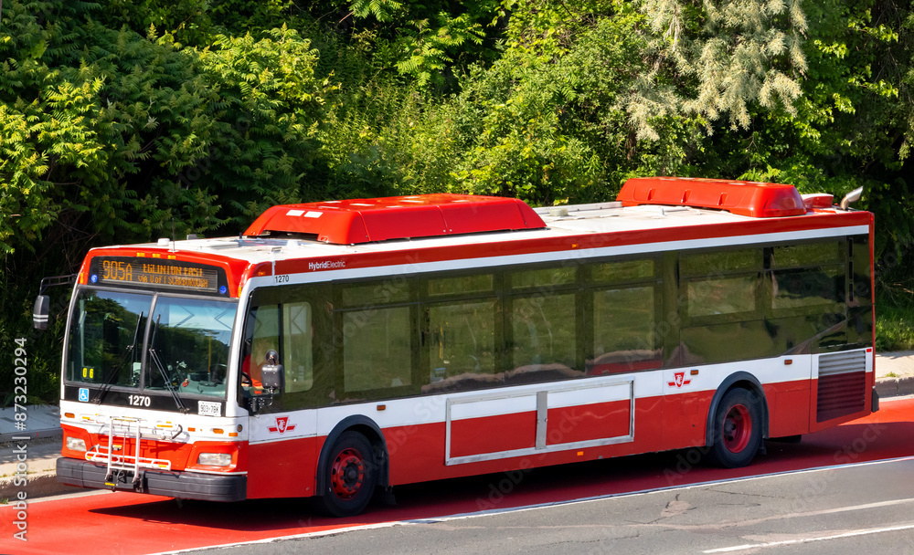 Toronto Canada, June 12 2024; A Toronto Transit Commission TTC hybrid ...