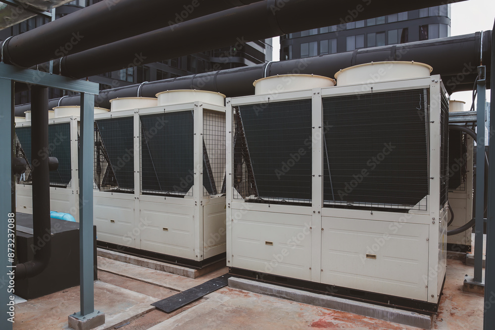 Air conditioner compressor installed in old building. Outdoor split ...