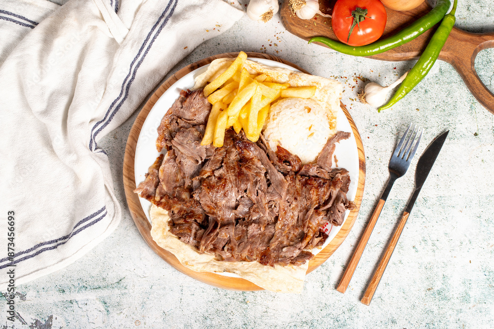 Meat doner with rice and French fries. Traditional Turkish cuisine ...