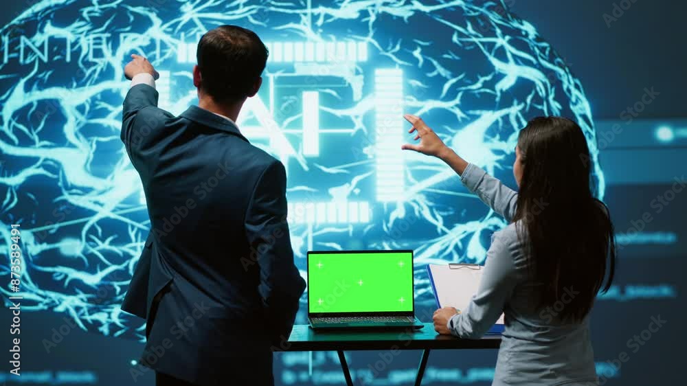 AI developers using isolated screen device for business data analysis. IT department staff ...